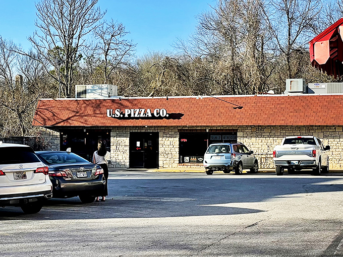 U.S. Pizza Co: Where patriotism meets pepperoni! This quaint exterior hides a world of cheesy delights waiting to be discovered.