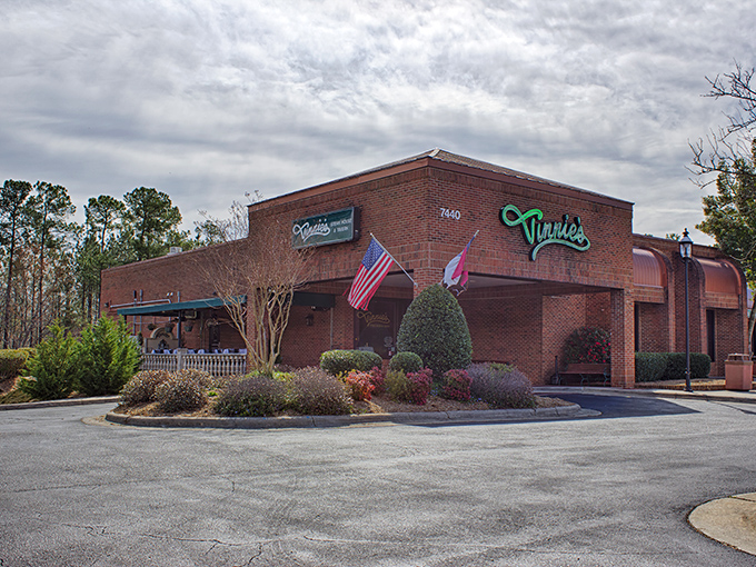 Vinnie's neon sign: A beacon of hope for the hungry. It's like the Bat-Signal, but for steak lovers.