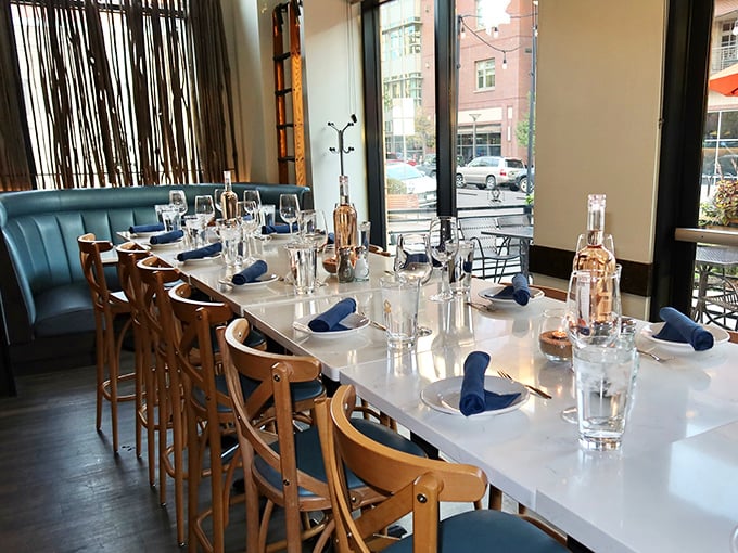 Dive into luxury at Blue Island's bar. It's so chic, you'll forget you're a mile above sea level &ndash; until you order that "altitude adjustment" cocktail.