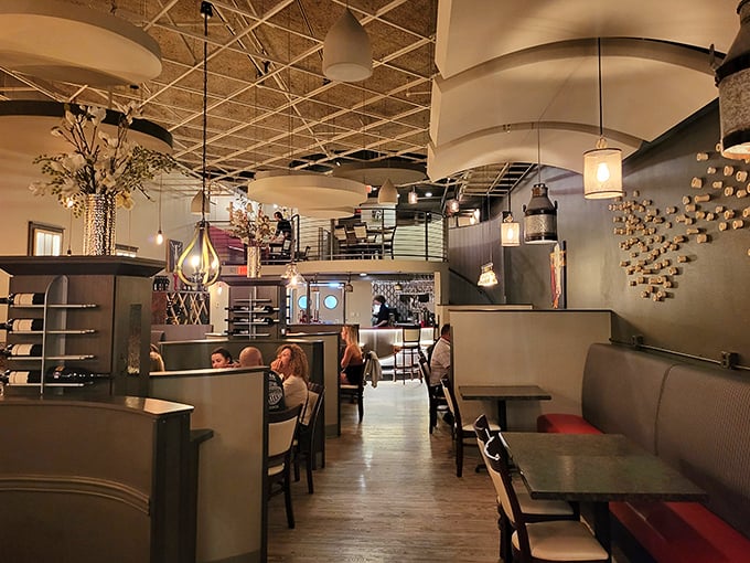 Inside Delmonico, modern chic mingles with rustic warmth. It's the perfect spot for a fancy date or impressing your in-laws from out of town.