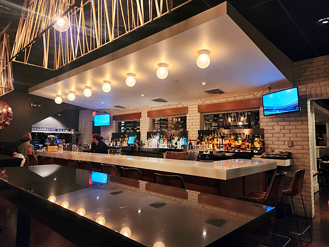 Mood lighting, gleaming bottles, and steaks that sizzle. KC Prime is dressing up dinner with a side of sophistication.