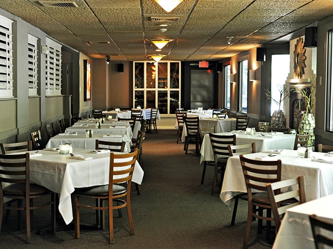 White tablecloths and warm vibes. Meritage's dining room feels like a secret club where the password is "medium-rare" and everyone's a VIP.