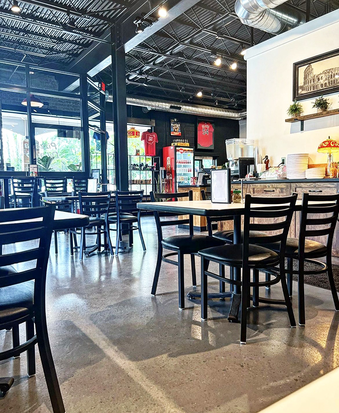 Industrial chic meets Italian heat at Pizzeria DiLauro. It's the kind of place that makes you want to dress up your sweatpants for a night out.