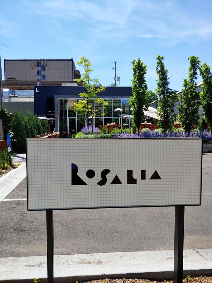 Rosalia's outdoor oasis: Purple blooms and pizza aromas mingle in the air. It's a slice of Minnesota magic that'll make you forget about mosquitoes.