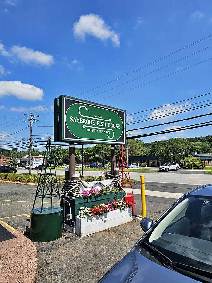 Flowers by the sign? How sweet! But the real bouquet here is the aroma of freshly cooked seafood wafting from inside.