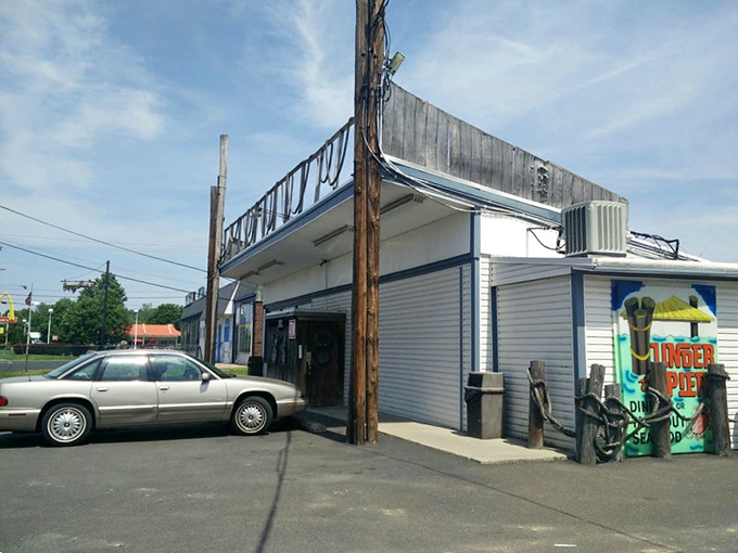 Dive into flavor at Under the Pier! This unassuming spot proves that sometimes the best seafood comes in packages as plain as a pearl's oyster.