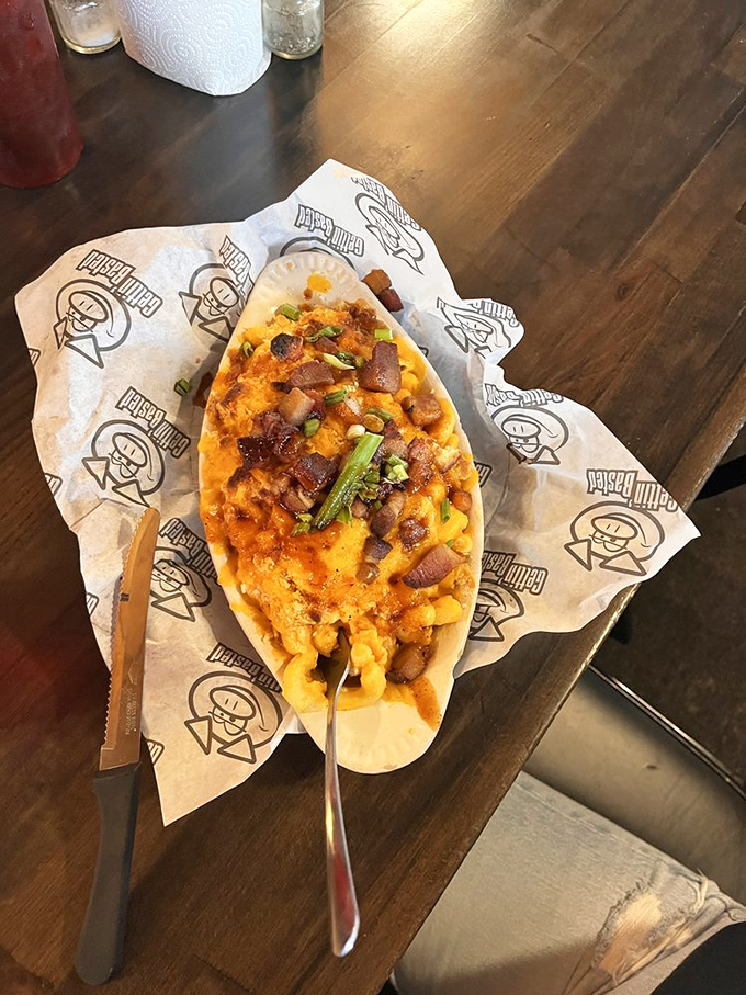 Not all heroes wear capes&mdash;some come in boat-shaped dishes with bacon bits and green onions atop molten cheese perfection.