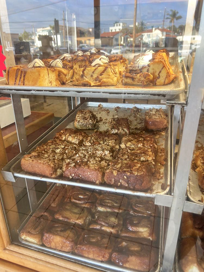 Feast your eyes on this carb-laden wonderland! These cinnamon rolls are stacked higher than your weekend to-do list, but infinitely more appealing.