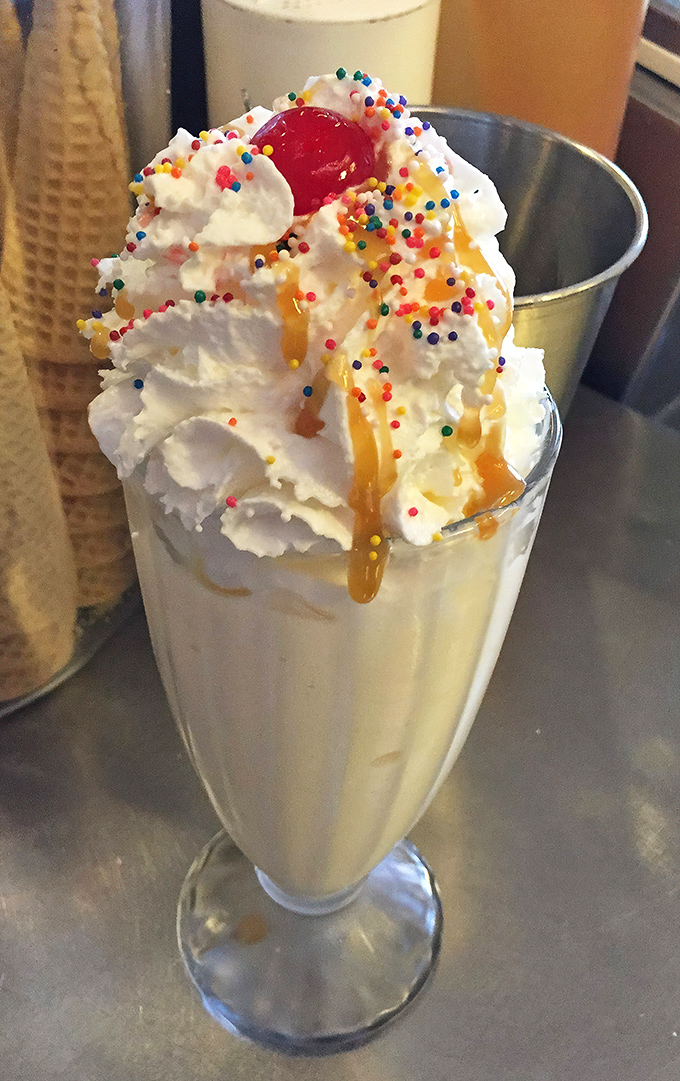 Holy moly, that's not a milkshake&mdash;it's a work of art! Topped with a mountain of whipped cream and a rainbow of sprinkles, this beauty is what dreams are made of.