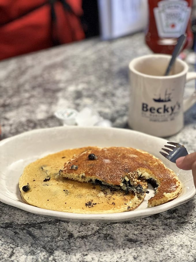 Holy hotcakes, Batman! These blueberry pancakes are so fluffy, they might float right off your plate if you're not careful.