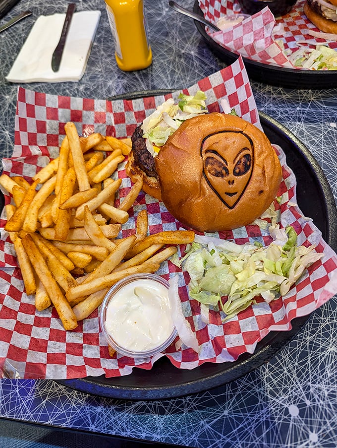 One small step for man, one giant leap for your appetite! This burger's got more layers than a UFO conspiracy theory.