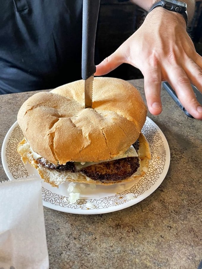 Behold, the star of the show! This cheeseburger isn't just a meal, it's a work of art that belongs in the Louvre of Lunch.