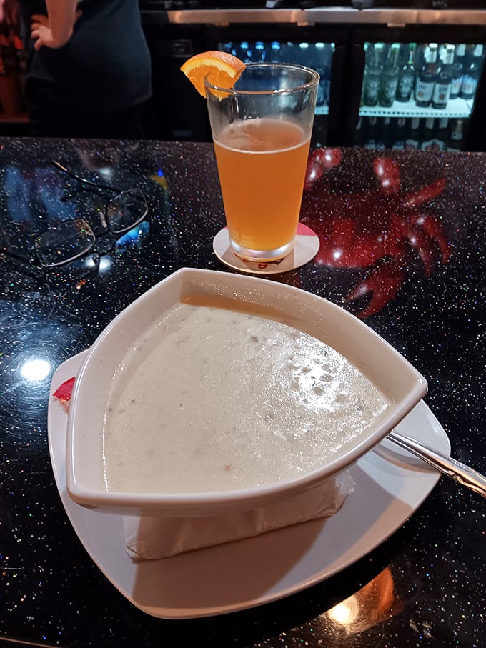 A bowl of comfort that could make Poseidon himself shed a salty tear. Paired with that sunset-hued brew? Neptune's nectar, indeed!