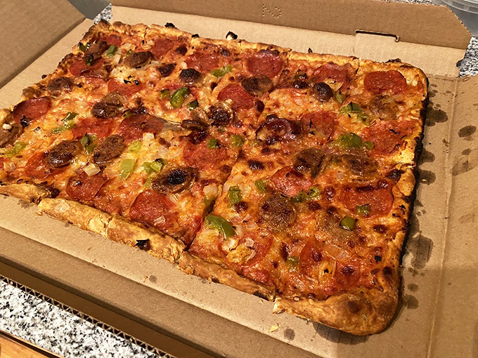 Pizza perfection, squared! This combination pie is a flavor fiesta, with each bite offering a new adventure for your taste buds.
