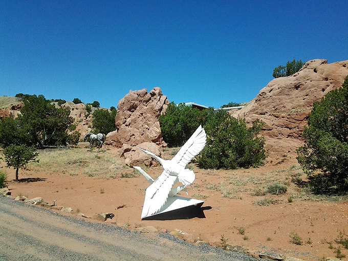 Is it a bird? Is it a plane? Nope, it's Cerrillos' very own abstract avian, ready for takeoff into the realm of imagination!
