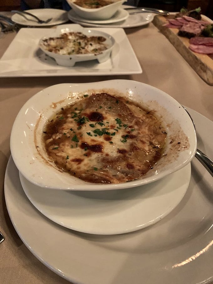 Behold, the crown jewel of comfort food! This French onion soup could make even the Mona Lisa crack a smile.