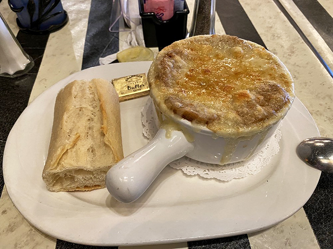 Behold, the crown jewel of comfort food! This French onion soup could make even the Mona Lisa crack a smile.