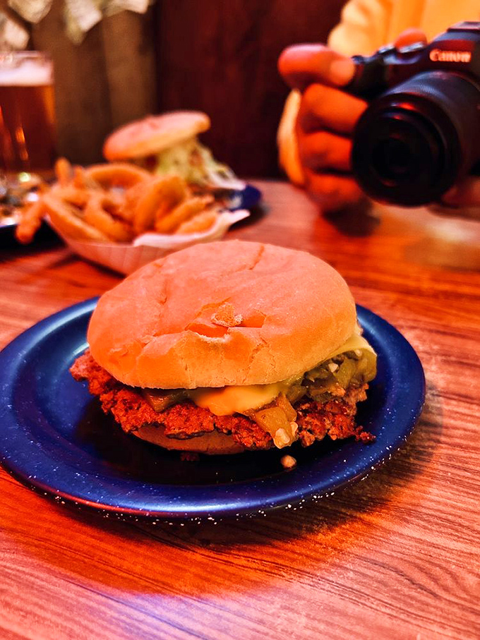 Behold, the green chile cheeseburger in all its glory! It's not just a meal, it's a spicy, cheesy work of art.