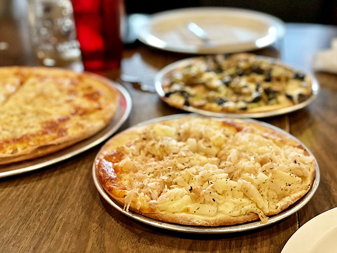 Hawaiian pizza that would make Don Ho sing with joy. Pineapple and ham doing the hula on a canvas of gooey cheese.