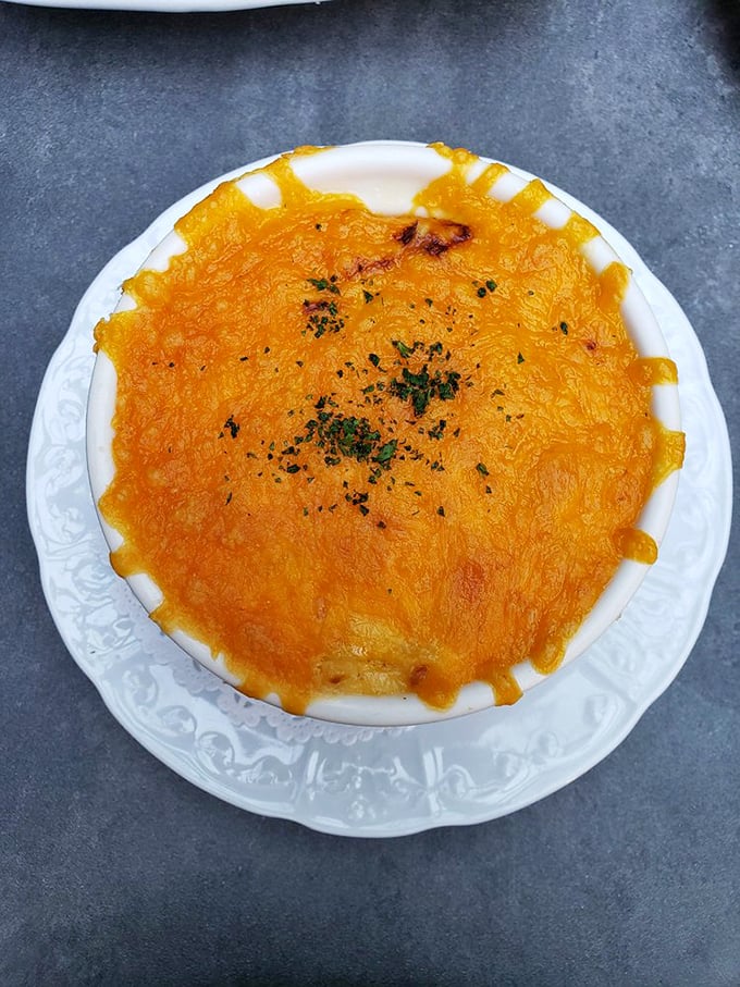 This mac and cheese doesn't just arrive at your table&mdash;it makes an entrance, with a golden top that crackles with anticipation.