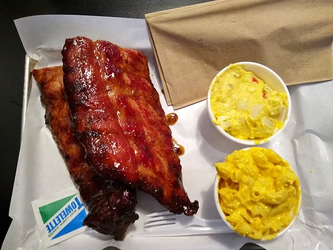 These ribs aren't just fall-off-the-bone tender; they're practically doing the cha-cha off the plate. Paired with creamy mac and cheese, it's comfort food nirvana.