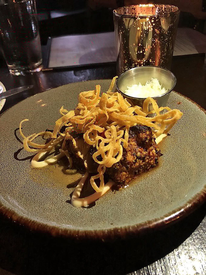 This isn't just food; it's edible art&mdash;where crispy garnishes dance atop a perfectly seared medallion that deserves its own gallery opening.