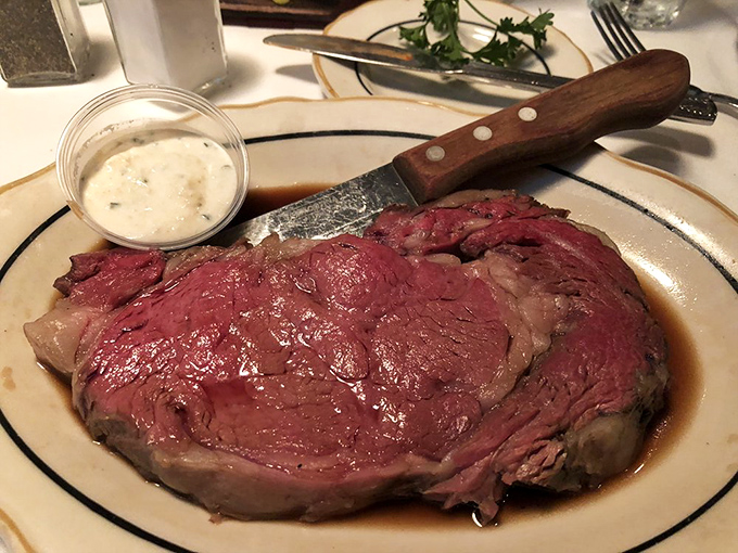 The prime rib arrives like a celebrity&mdash;commanding attention, perfectly dressed, and absolutely worth the wait for an audience.