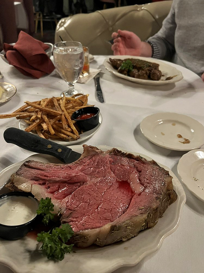 Behold, the star of the show! This prime rib is so tender, it practically melts on your plate. Paired with crispy fries, it's a match made in comfort food heaven.