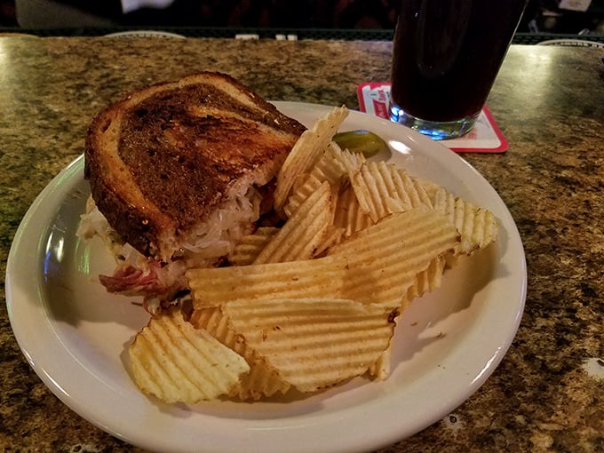 Behold, the Reuben in its natural habitat. It's not just a sandwich; it's a work of art that belongs in the Louvre of Lunch.