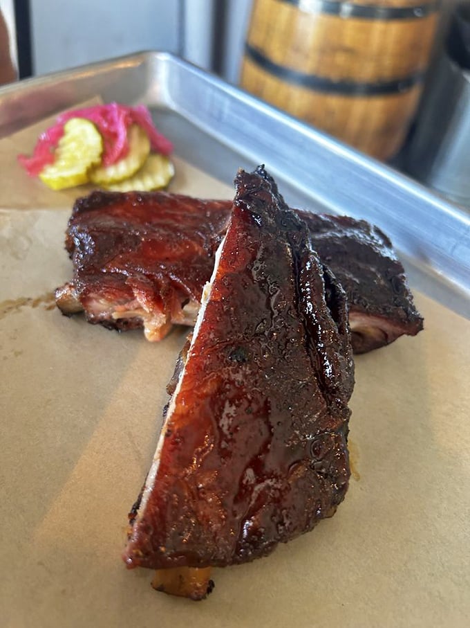 These ribs aren't just fall-off-the-bone tender; they're practically jumping into your mouth. Resistance is futile, my friends.