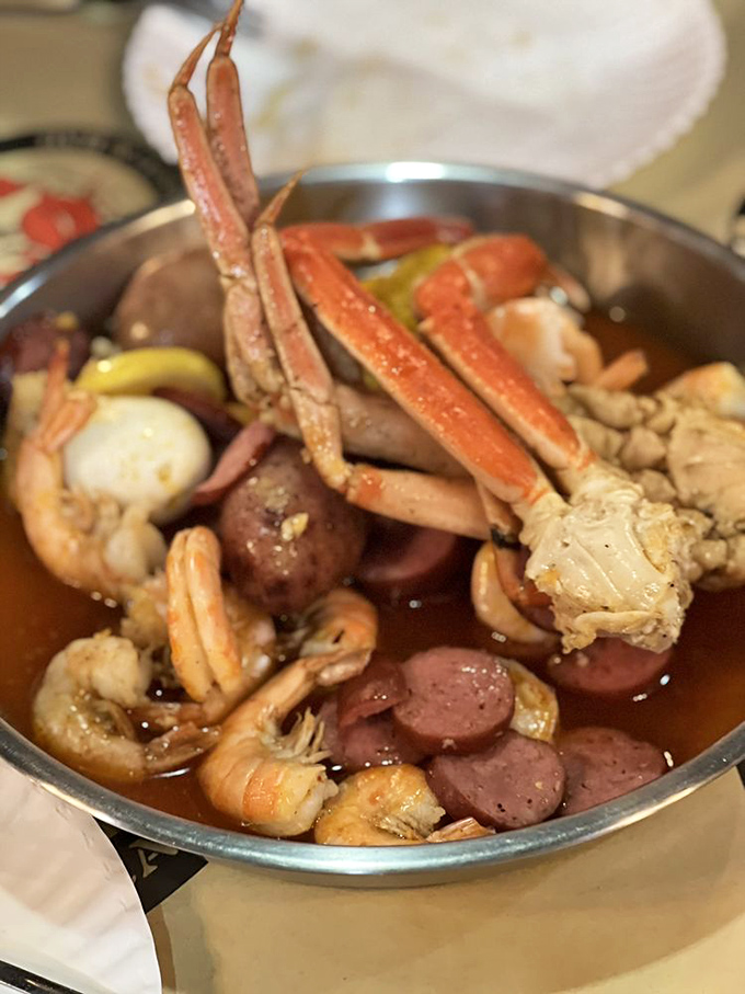 Behold the seafood cornucopia! It's like the ocean decided to throw a party on your plate, and everyone's invited &ndash; even the corn and sausage.