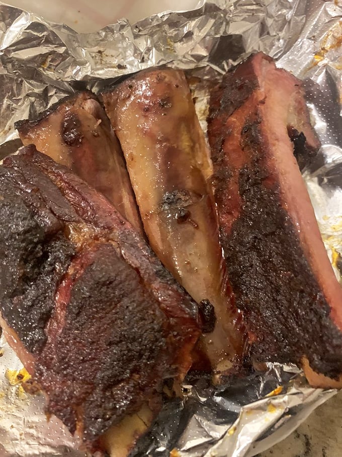 Holy smoke rings, Batman! These St. Louis cut ribs are so tender, they're practically falling off the bone. Napkins are not optional.