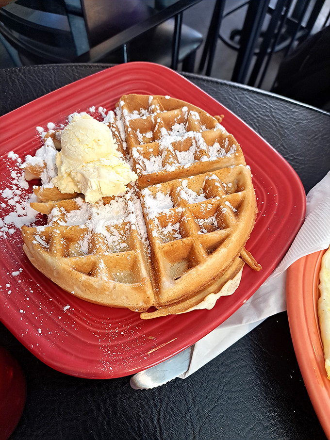 Golden, crispy, and ready for its close-up. This waffle is the Brad Pitt of breakfast foods &ndash; irresistible, perfectly formed, and guaranteed to make your morning.