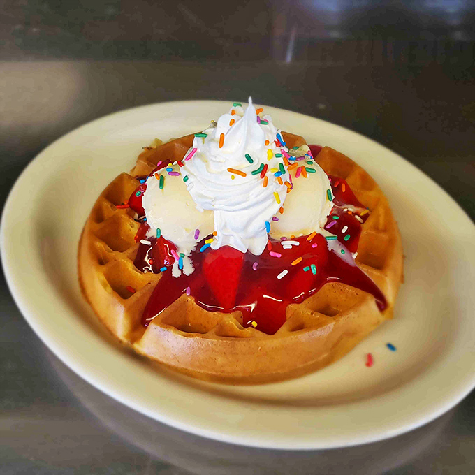 Waffles gone wild! This colorful creation is what happens when breakfast meets Mardi Gras. It's a party on a plate that'll make your taste buds do a happy dance.