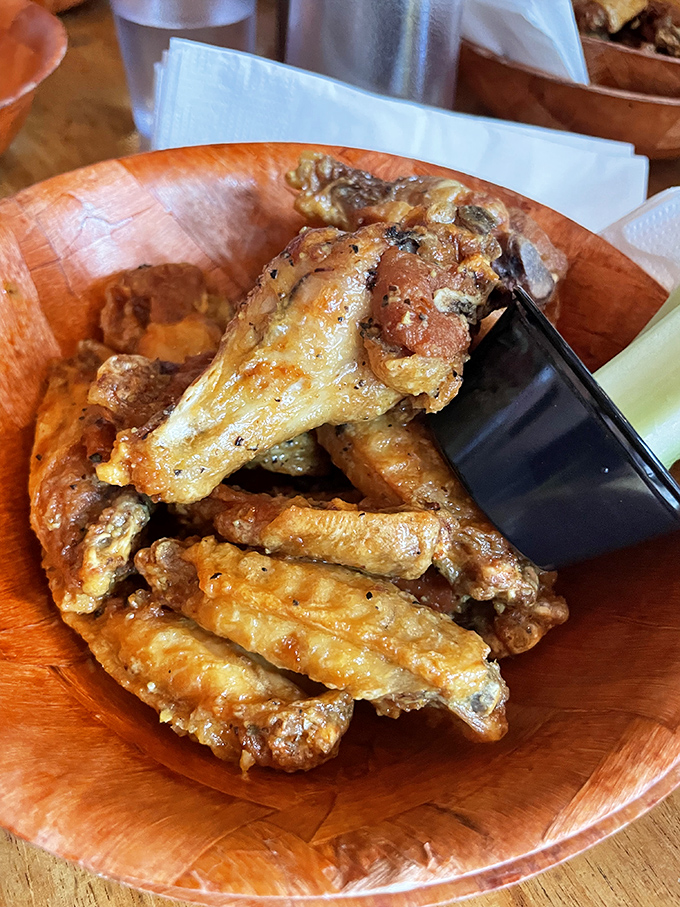 Golden, glistening, and ready for their close-up. These wings are dressed to impress and eager to meet your mouth.