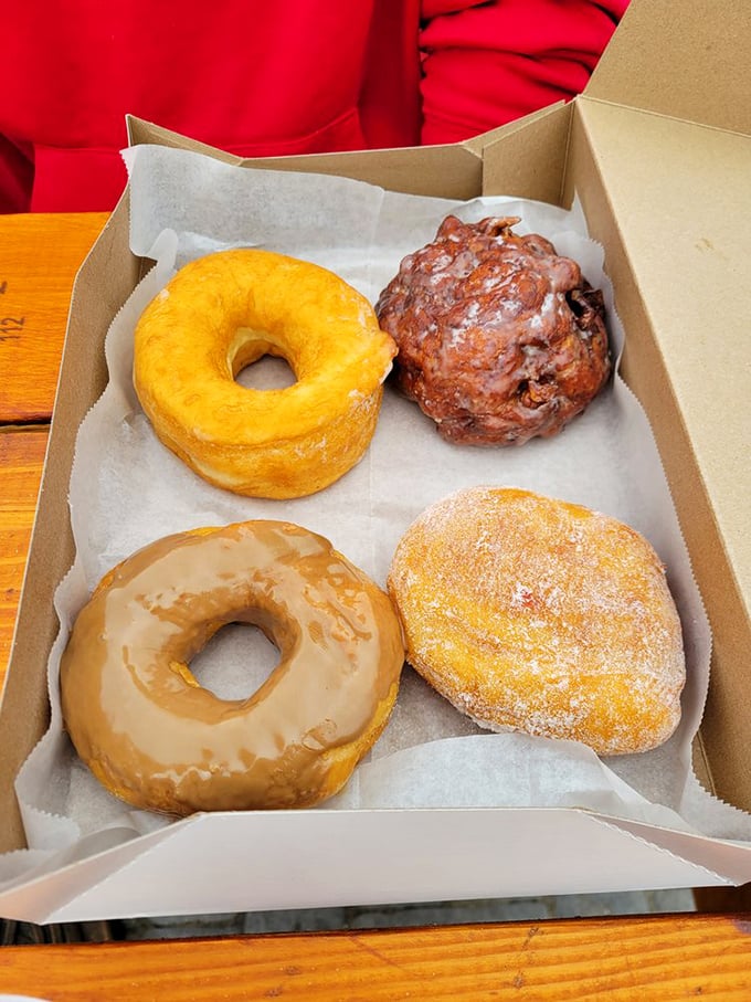 Behold, the holy quartet of doughnuts. From golden-glazed to chocolate-dipped, it's like a box set of your favorite sugar-coated TV series.