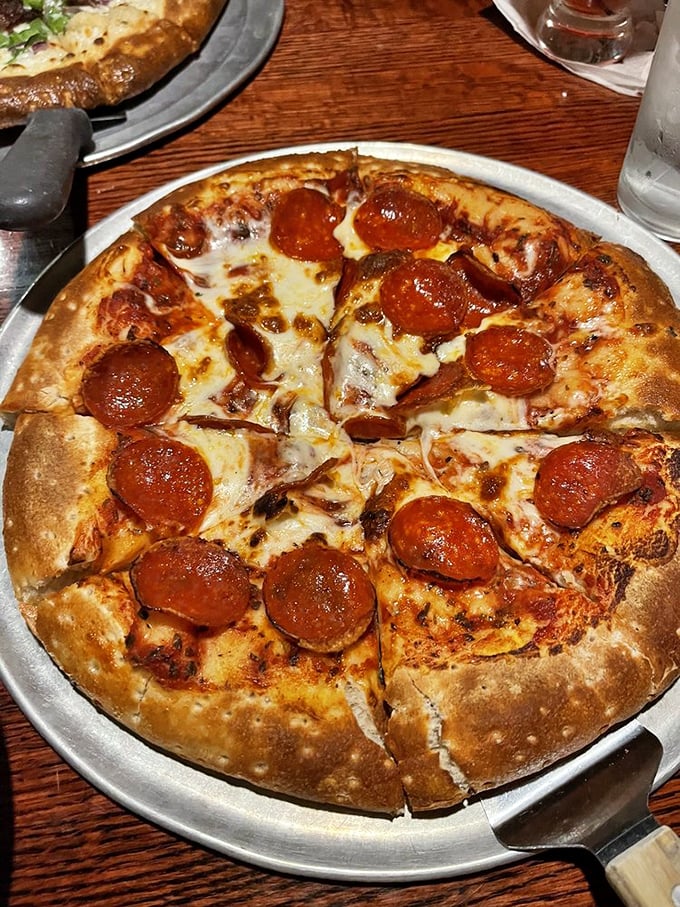 Pepperoni perfection! This pie is so loaded, it's like each slice is wearing its own delicious polka dot dress.
