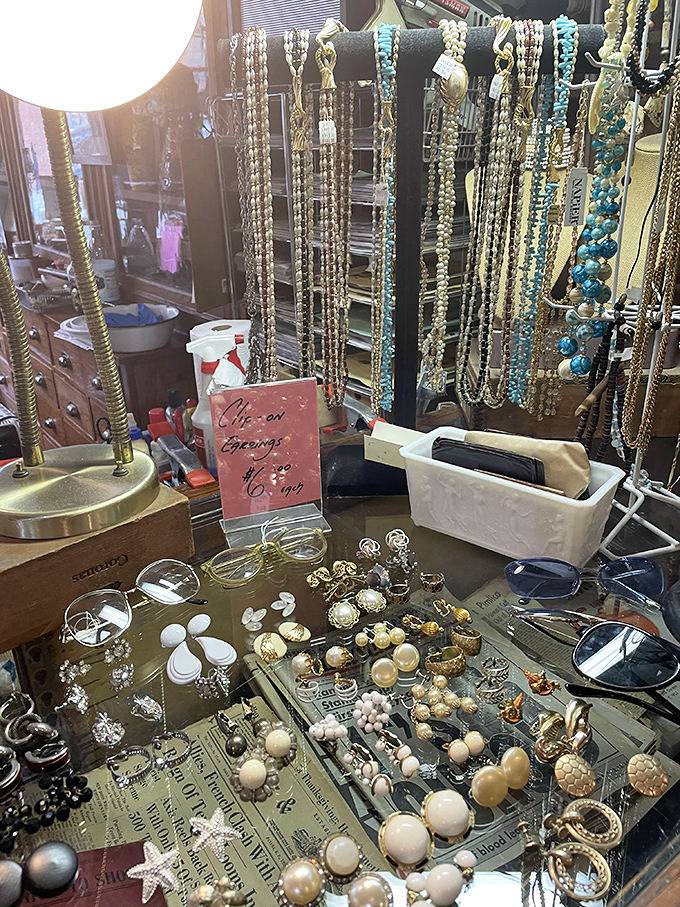Pearls, pendants, and... is that a starfish? This jewelry display is like a pirate's treasure chest meets Coco Chanel.