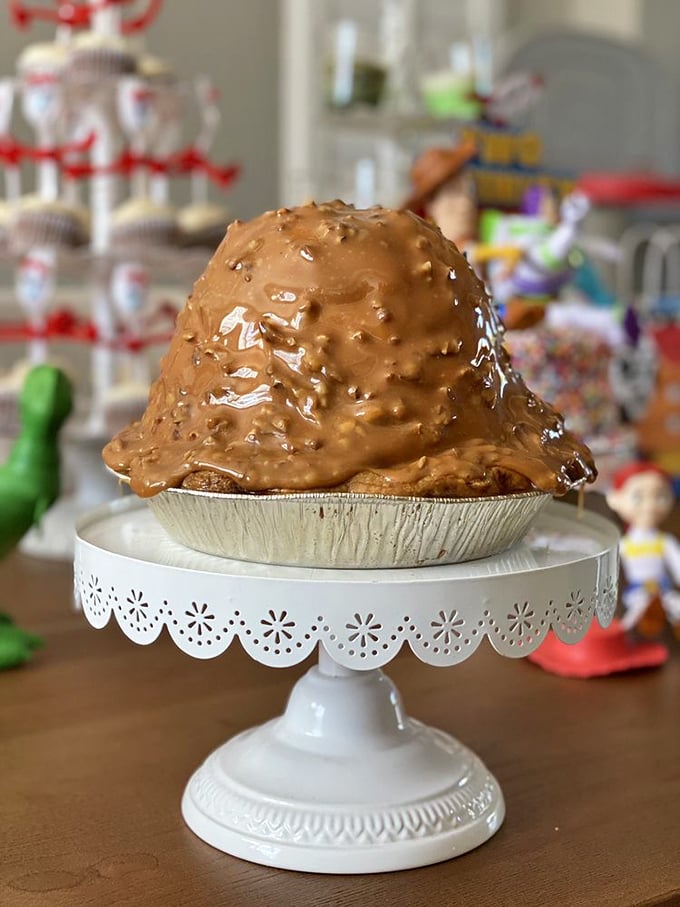 Holy apple-ocalypse! This caramel-drizzled mountain of a pie could make Newton question his theory of gravity.