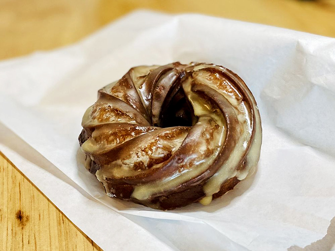 Holy cruller, Batman! This apple cider beauty is what autumn dreams are made of. It's like biting into a crisp fall day, if fall days were glazed and deep-fried.