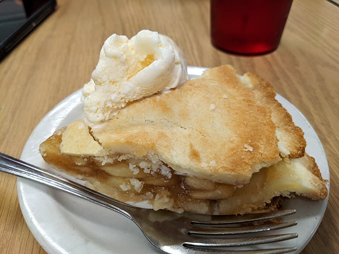 Behold, the apple pie of your dreams! Golden, flaky crust cradling a mountain of apples &ndash; it's like autumn decided to throw a party on your plate.
