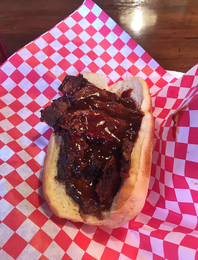 Holy smokes! This BBQ beef brisket sandwich looks like it could cure any ailment. It's not just a meal, it's a flavor-packed prescription for happiness.