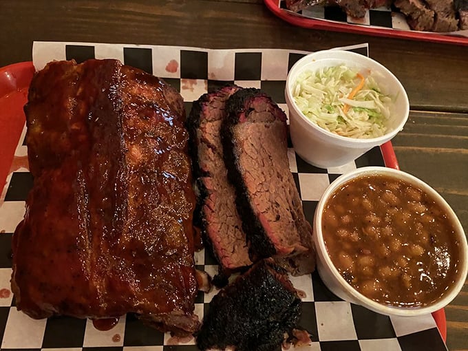 Behold the holy trinity of barbecue&mdash;ribs lacquered to perfection, brisket with that telltale smoke ring, and sides that know their supporting role isn't just a courtesy appearance.