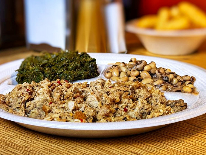 Behold, the holy trinity of Southern comfort: tender pulled pork, collard greens, and black-eyed peas. It's like a hug for your insides.