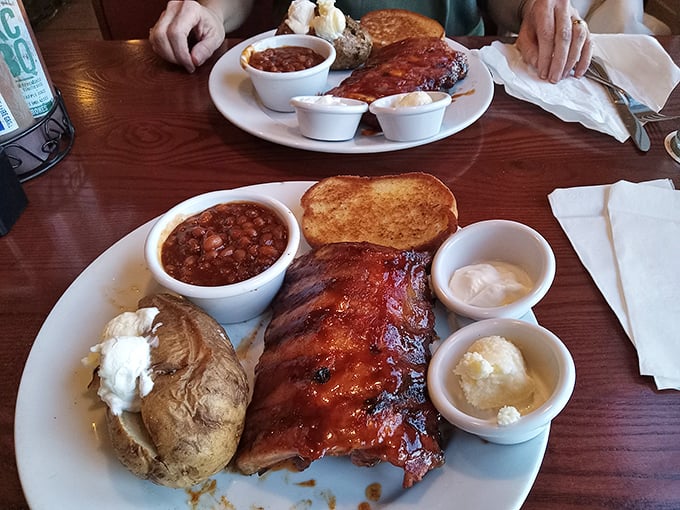 Holy smokes! This platter is what BBQ dreams are made of. It's not just a meal; it's a meaty masterpiece that would make even Fred Flintstone do a double-take.