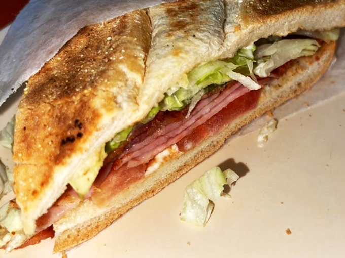 Behold, the BLT that launched a thousand food comas. Crispy, salty, fresh, and juicy – it's like a flavor party, and your taste buds are VIP guests.