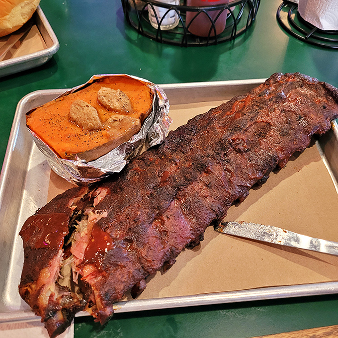 Behold, the pi&egrave;ce de r&eacute;sistance! These ribs aren't just fall-off-the-bone tender; they're practically levitating with flavor.