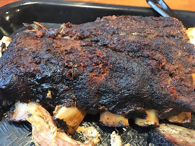 Behold, the BBQ ribs in all their glory! So tender, they're practically falling off the bone while whispering sweet nothings to your taste buds.
