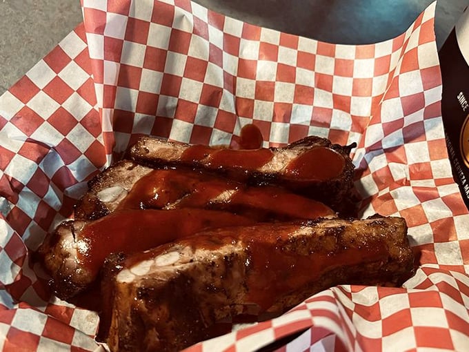 Holy smoke rings, Batman! These ribs look so tender, they might just fall off the bone with a stern glance.