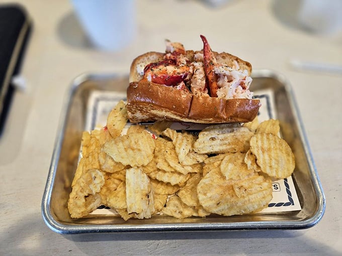 The star of the show! This lobster roll is so packed, it's like the crustacean equivalent of clowns piling into a tiny car.